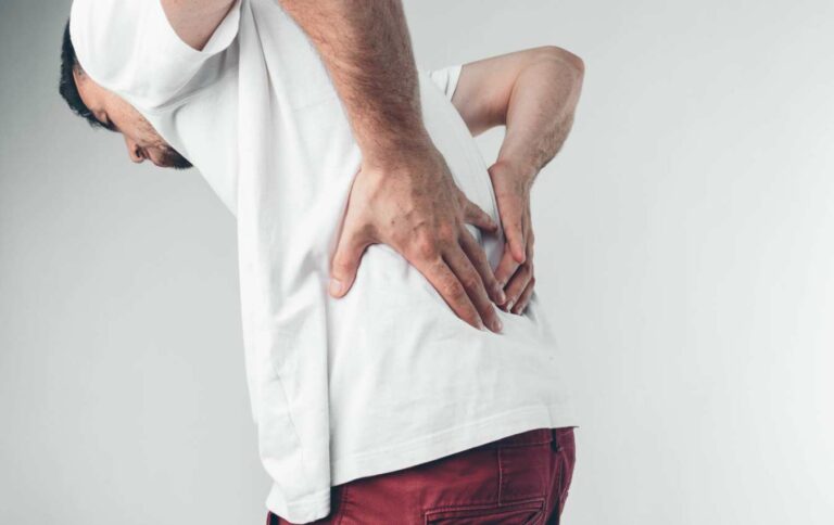 Tackling Back Pain When Walking: Causes and Treatments